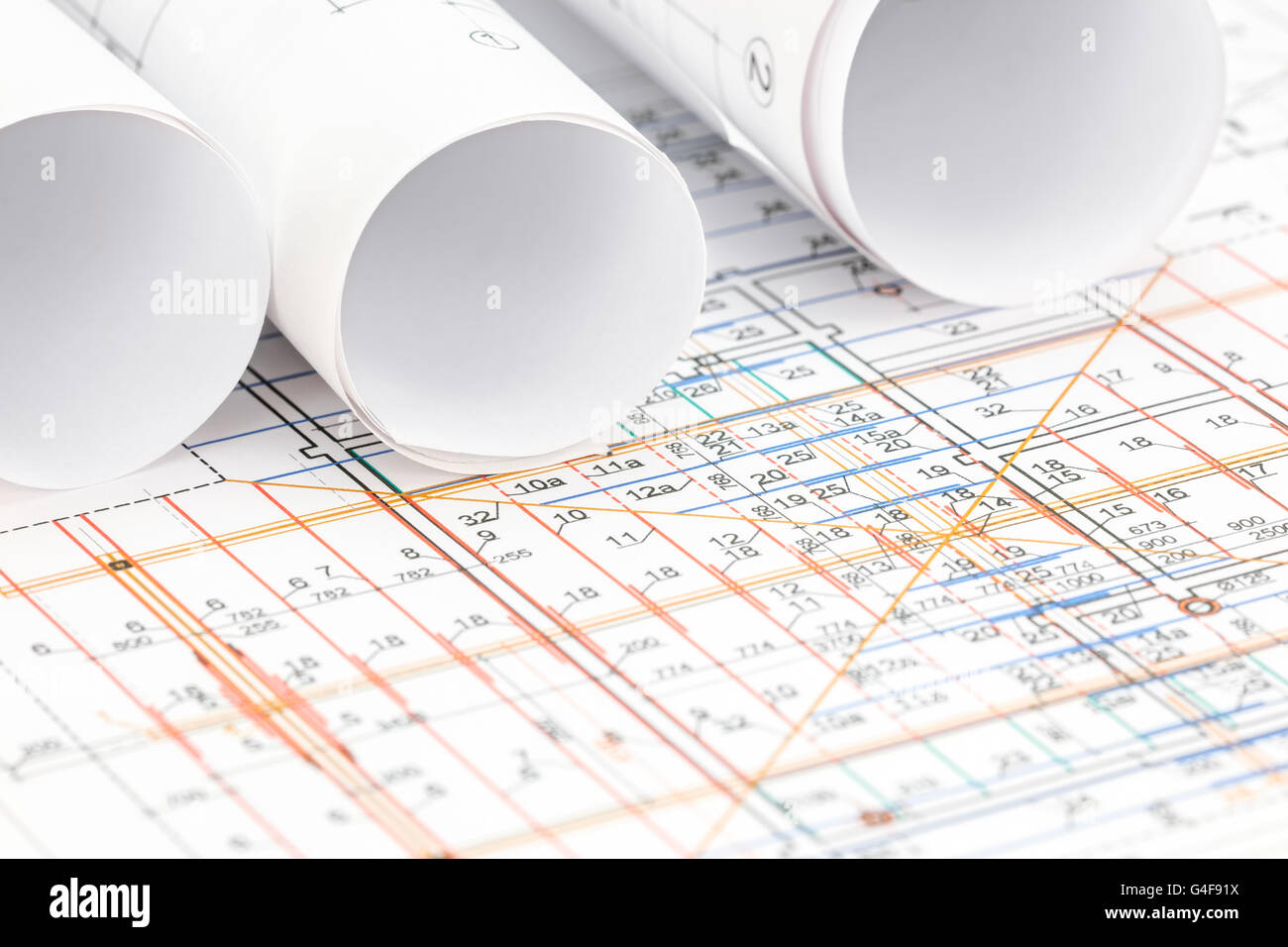engineering drawing detail and rolls of floor plan blueprints Stock ...