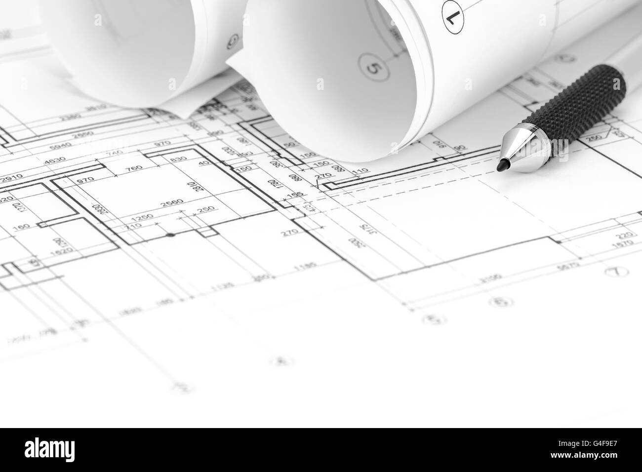 architect workspace with floor plan, blueprint roll and pencil Stock ...