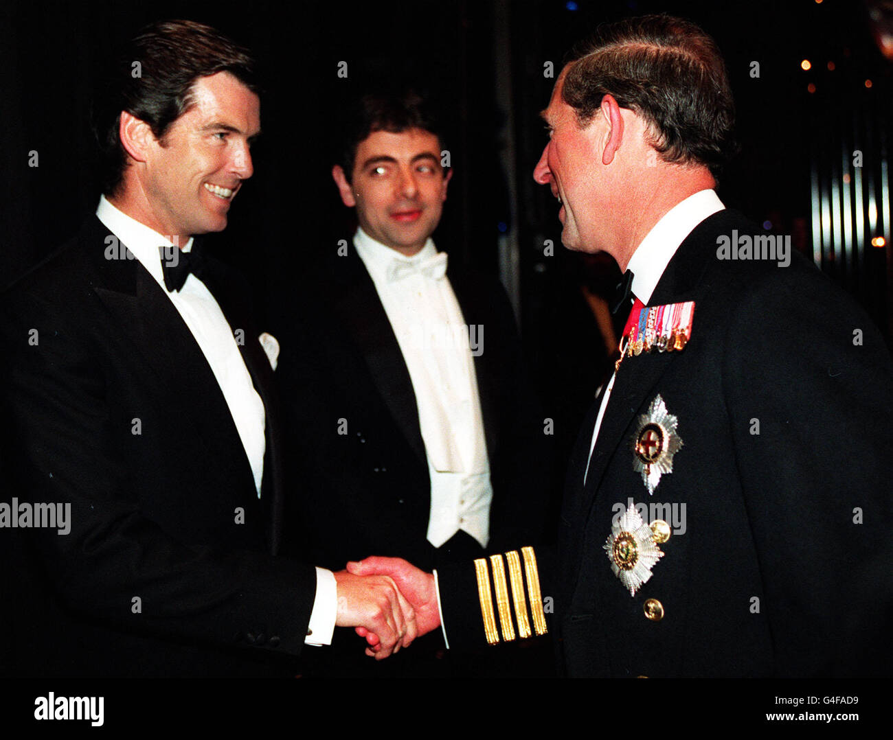 Prince charles and pierce brosnan hi-res stock photography and images ...
