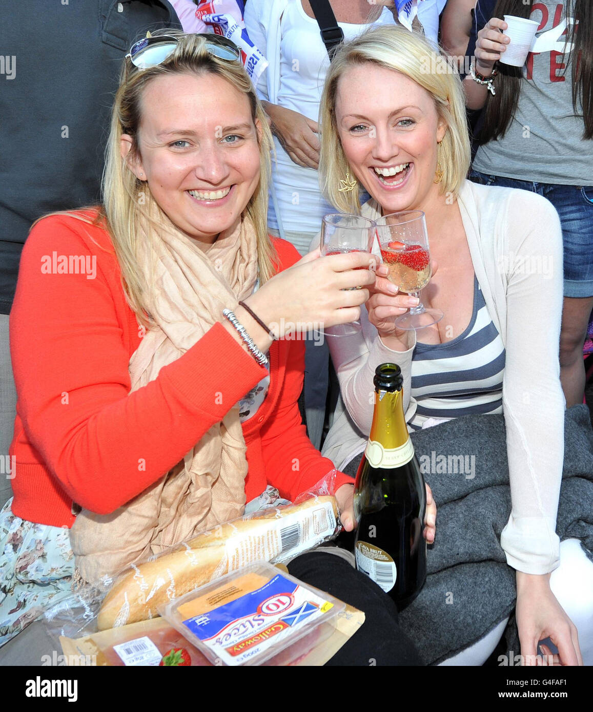 Emma Aitken (left) and Louise McKenzie wait near Canongate Kirk ...