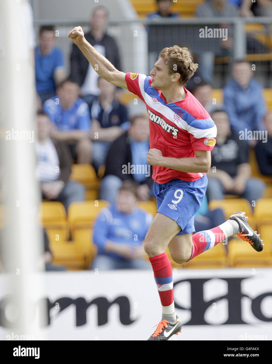 Rangers' Nikica Jelavic celebrates scoring their second goal during the ...