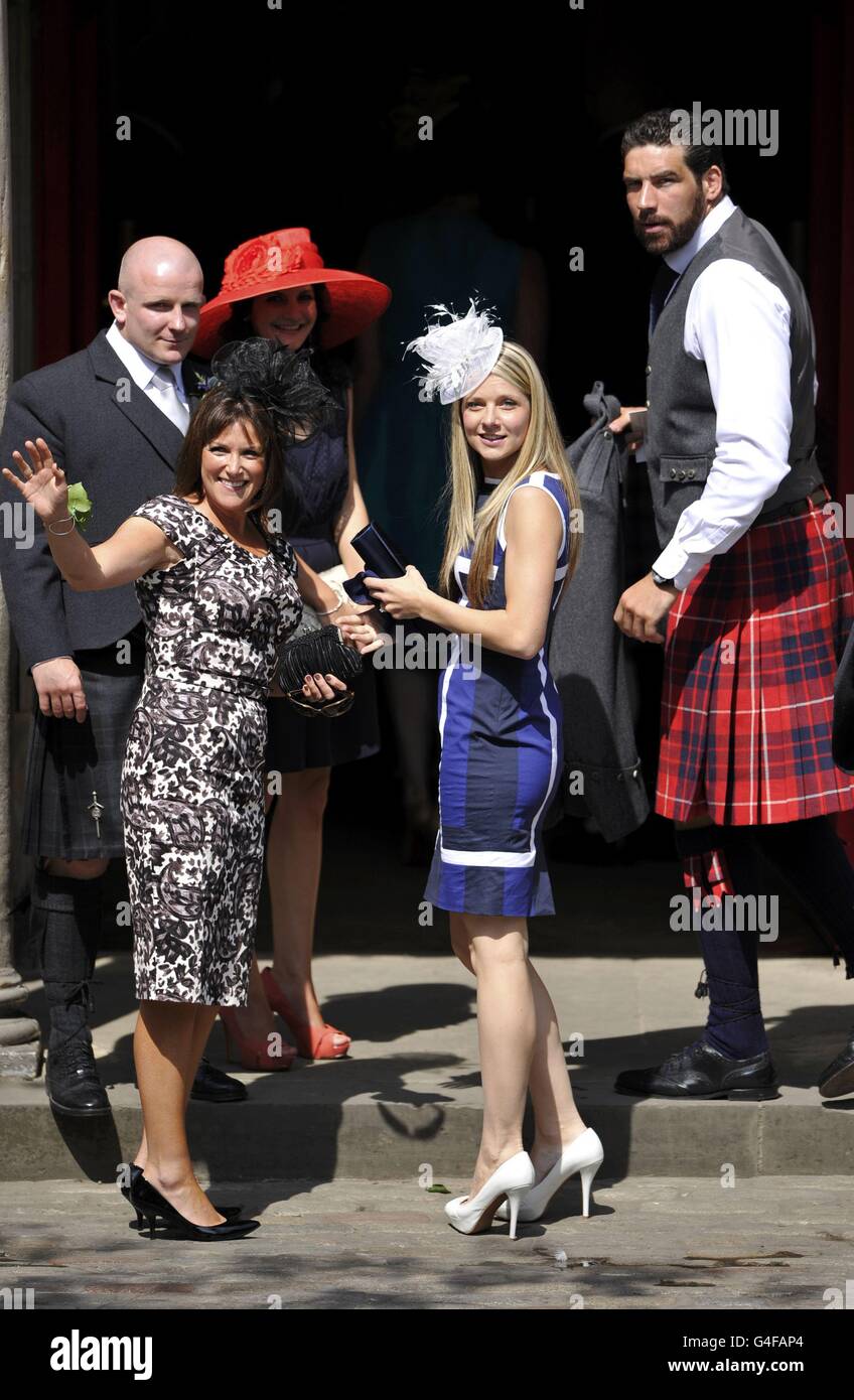 Unidentified guests arrive for the wedding of Mike Tindall and Zara ...