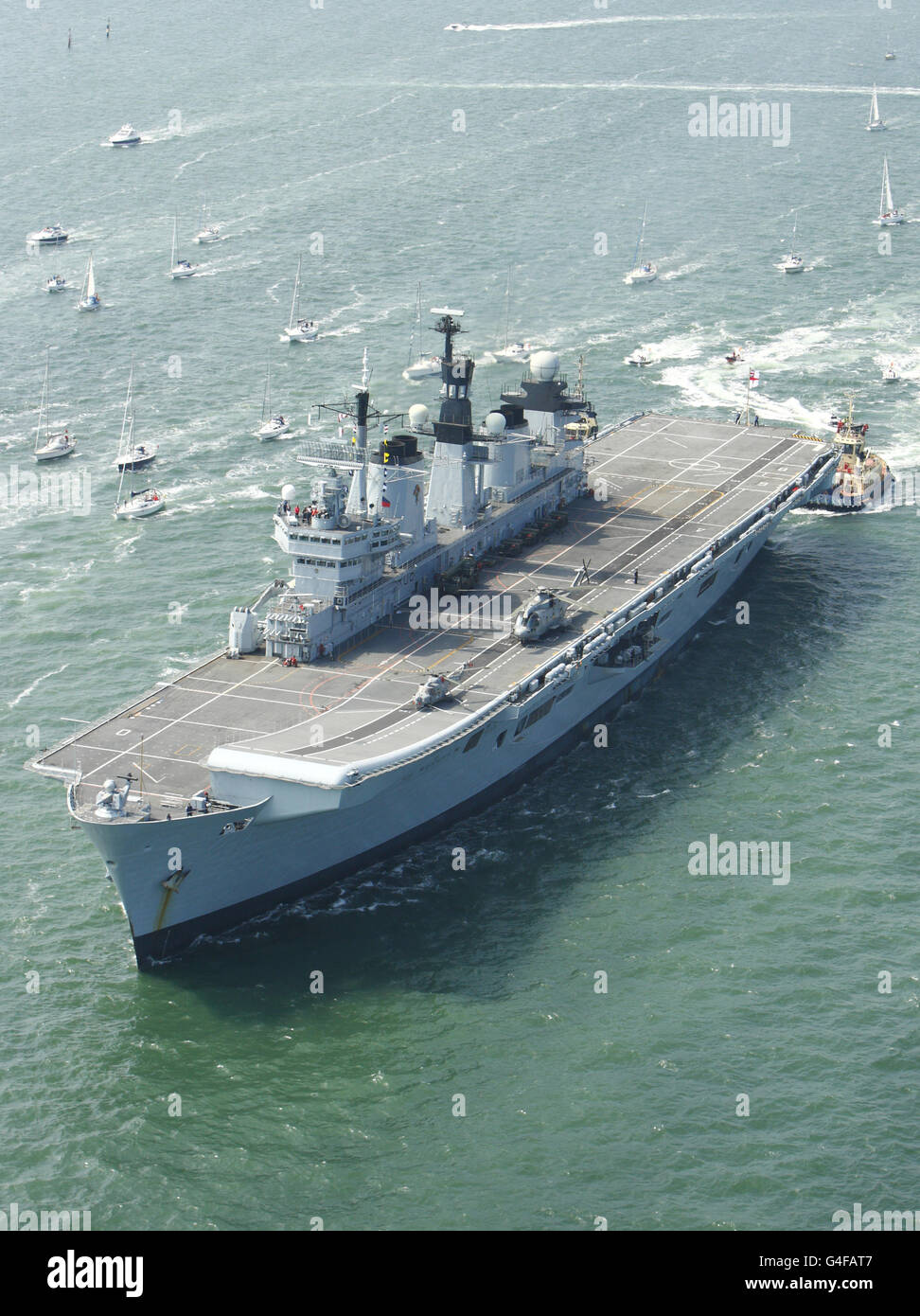 The Royal Navy aircraft carrier HMS Illustrious on Southampton Water ...