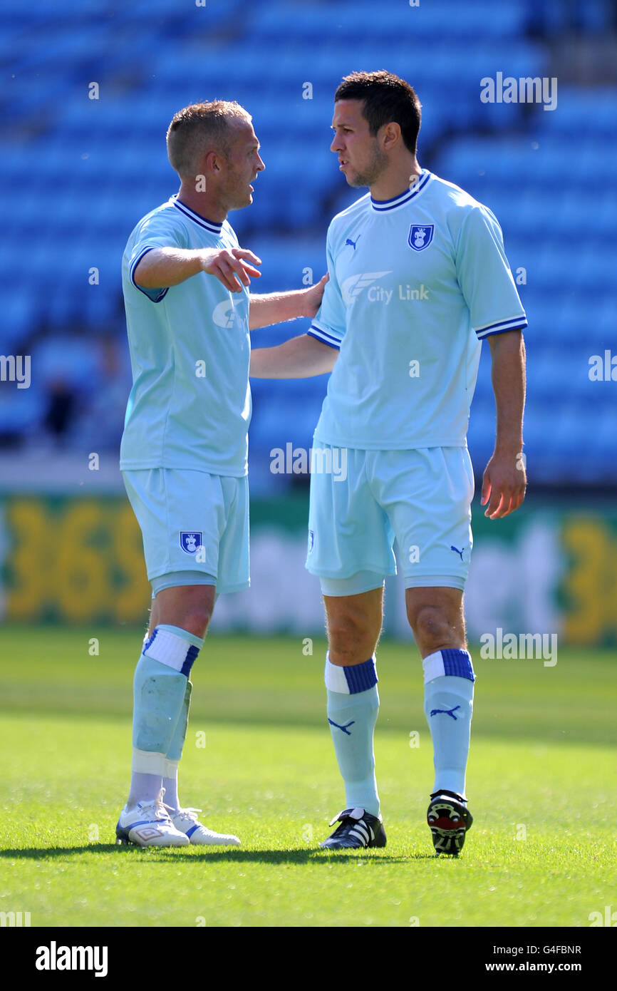 Coventry city captain sammy clingan talks to teammate richard wood hi ...