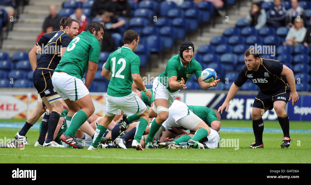 Ireland's Ross Rennie passes the ball out during the EMC Test match at ...