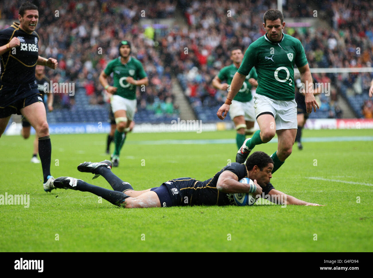 Scotland's Joe Ansbro scores the winning try during the EMC Test match ...