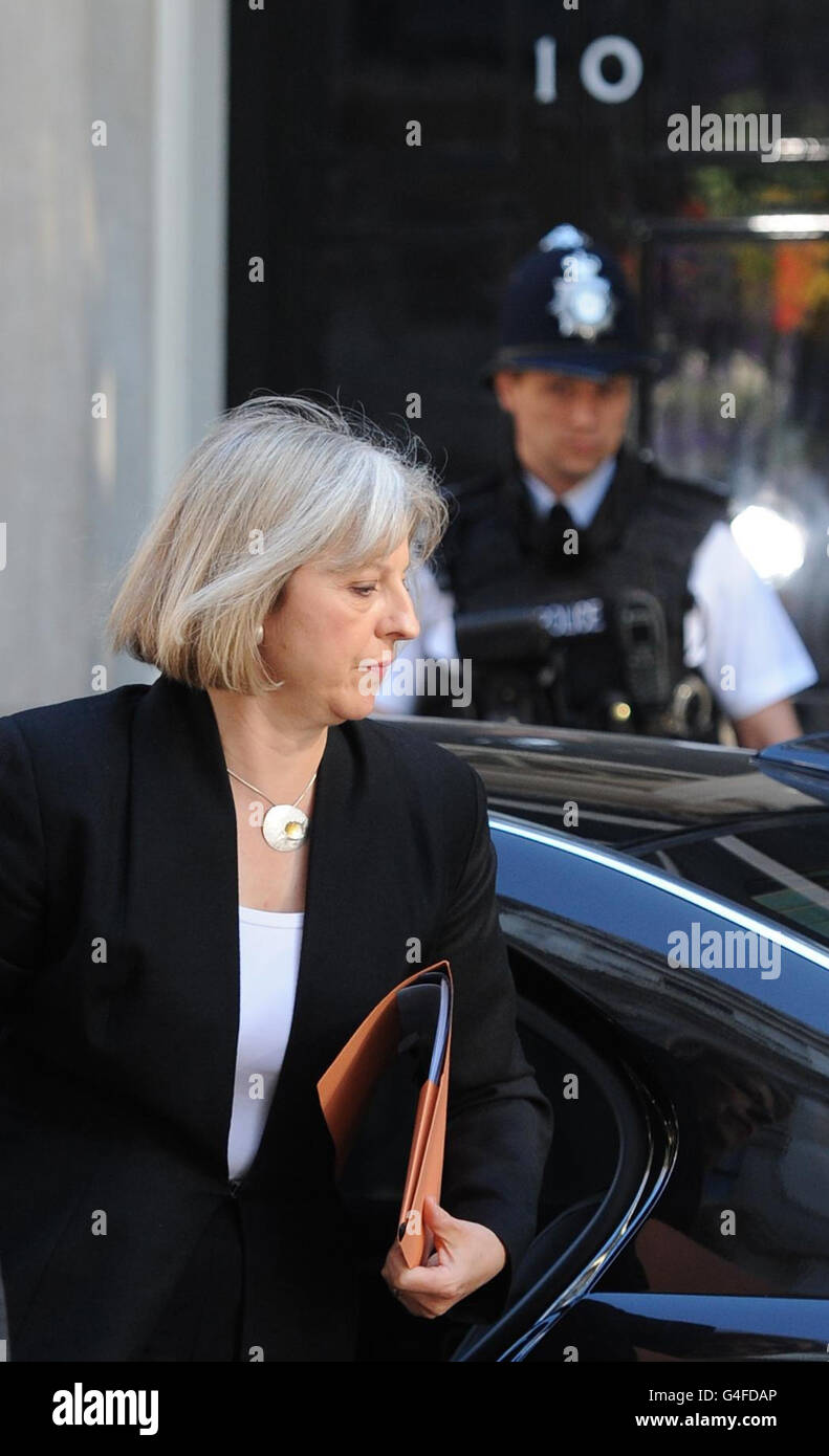 Home Secretary Theresa May arrives in Downing Street in London, to ...