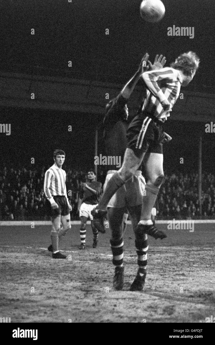 Hartlepool United goalkeeper George Smith in action, watched by ...