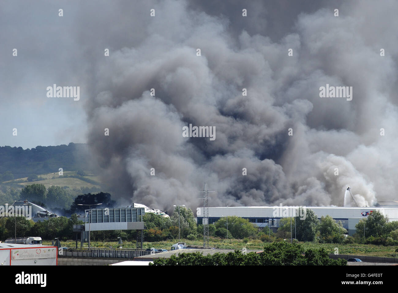 A general view of smoke rising from a Sony distribution building in ...