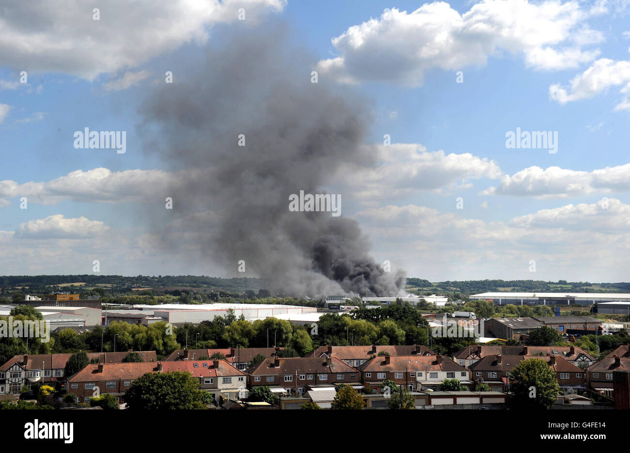 A general view of smoke rising from a Sony distribution building in ...