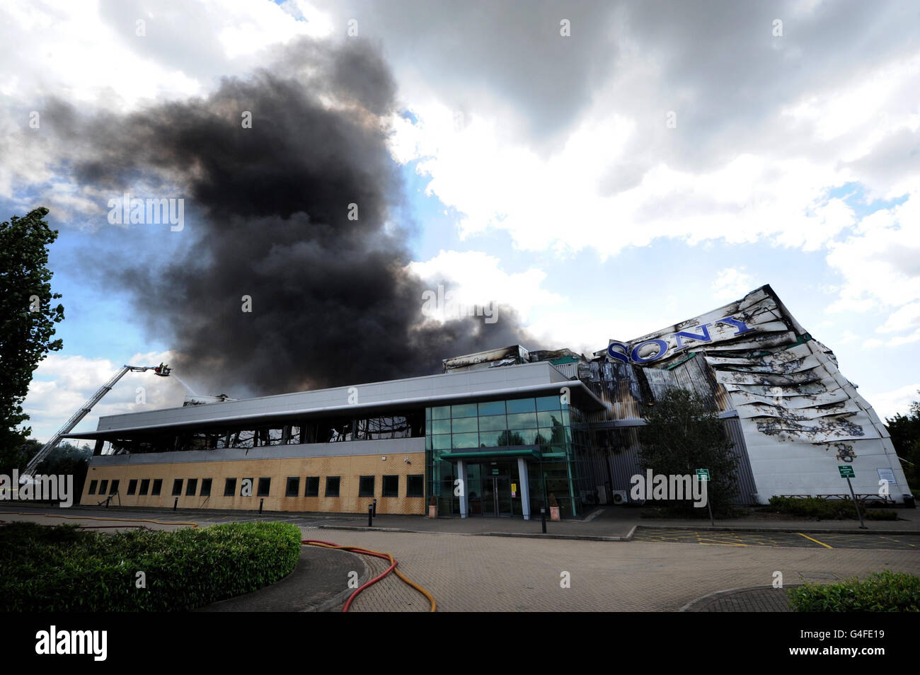 A general view of smoke rising from a Sony distribution building in ...