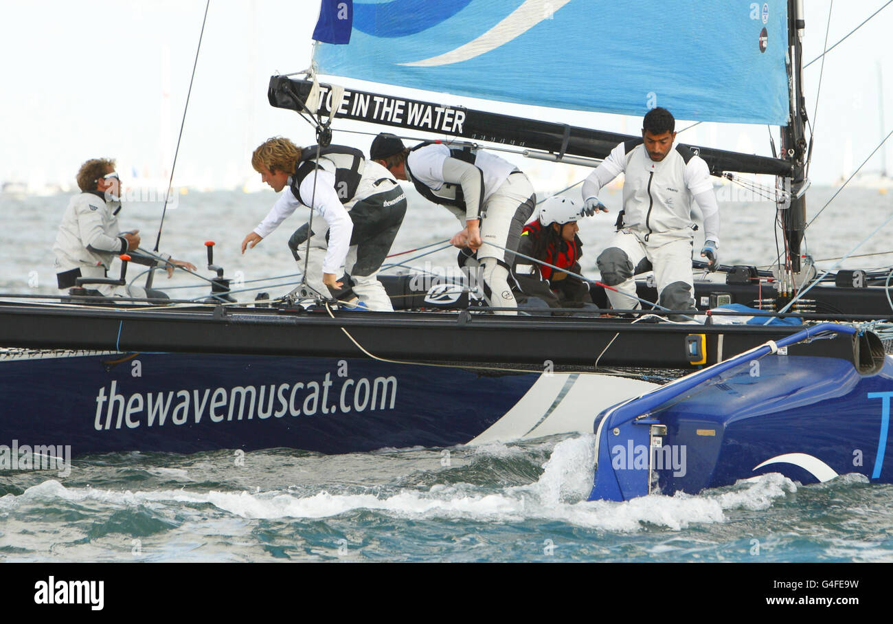 Leigh McMillan (second left) and his crew come about the windward mark ...