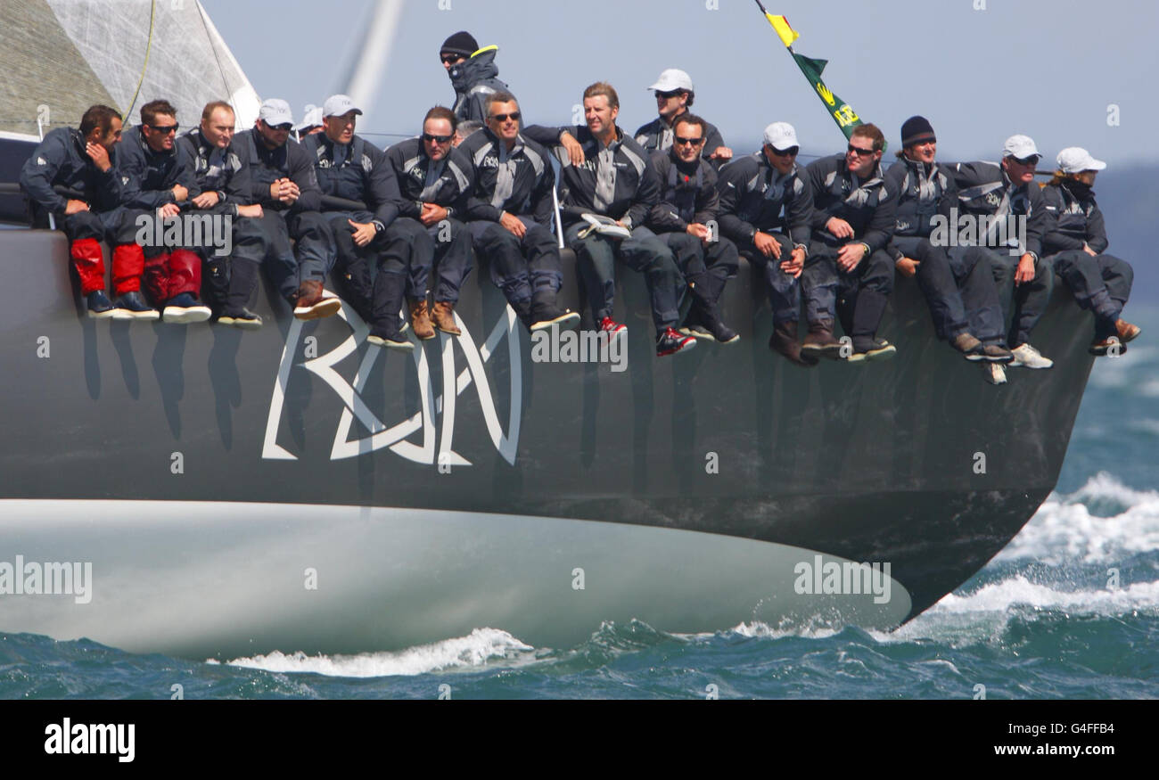 Sailing - 44th Fastnet Race - The Solent. The crew of Ran line the rail ...