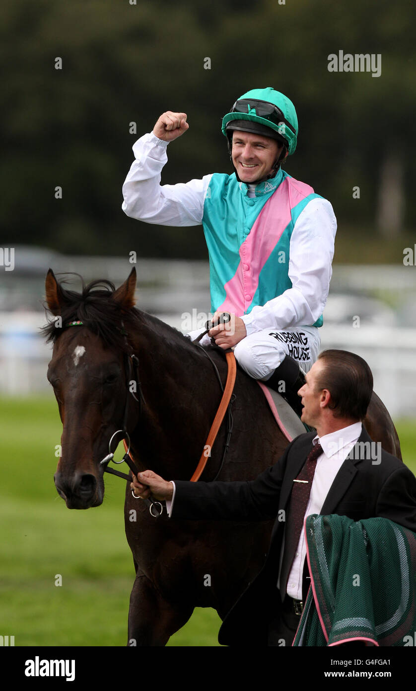 Ian Mongan celebrates after riding Twice Over to victory in The ...