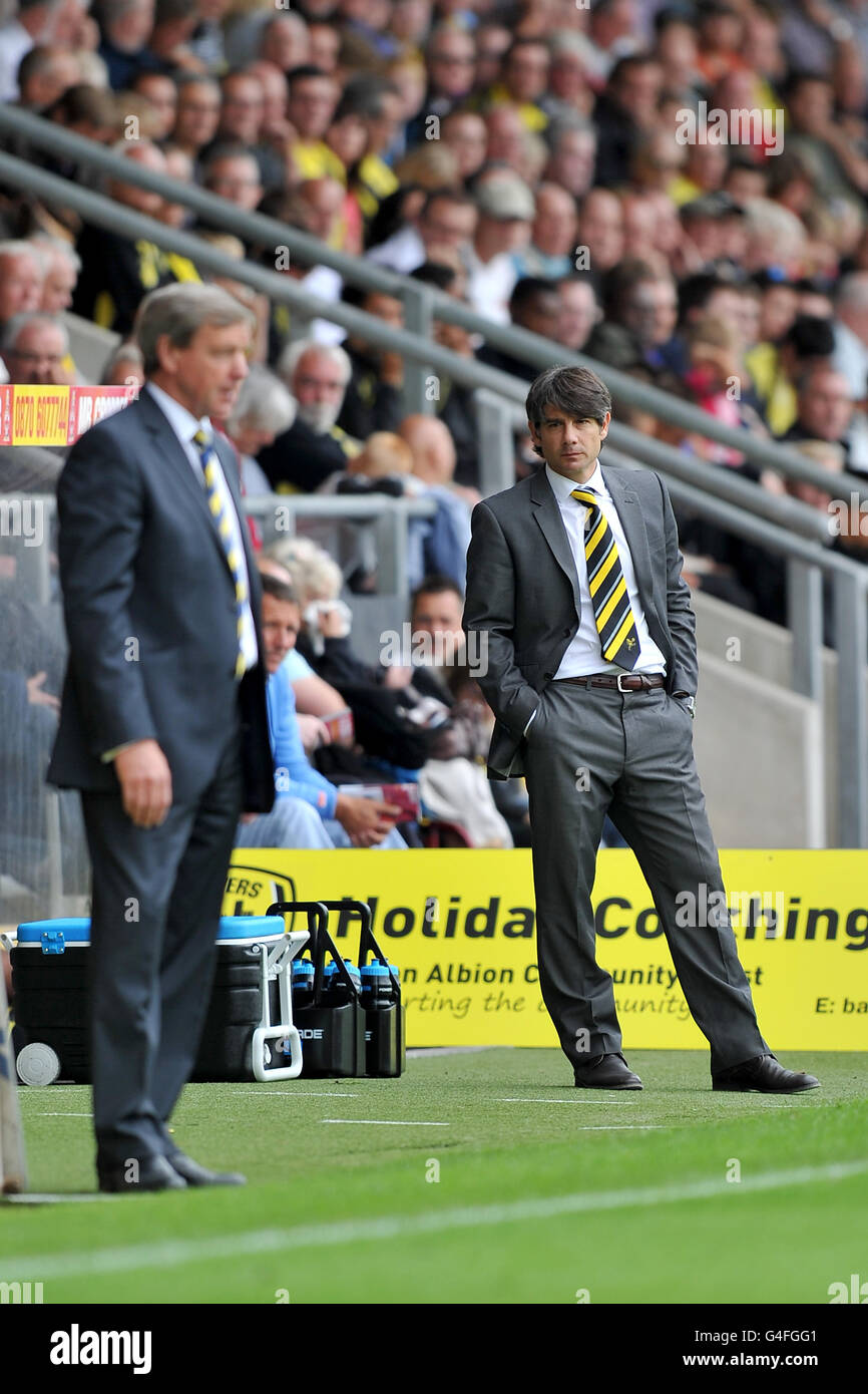 Shrewsbury Town manager Graham Turner (left) and Burton Albion manager ...