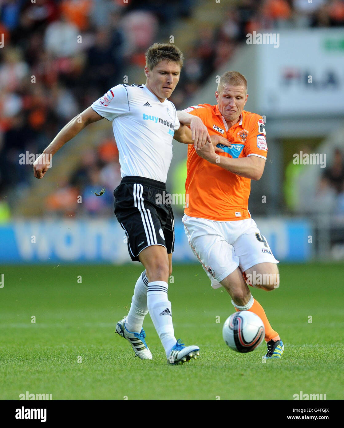 Blackpool's Keith Southern battles with Derby County's Jeff Kendrick ...