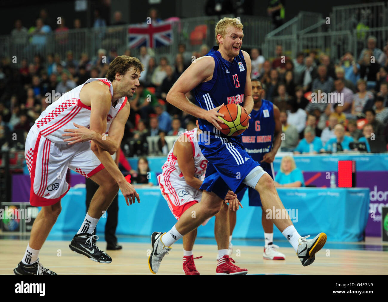 Great Britain's Dan Clark gets away from Croatia's Marko Car during ...