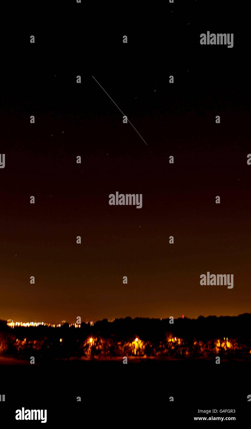 The International Space Station is seen orbiting the earth over Woolton ...