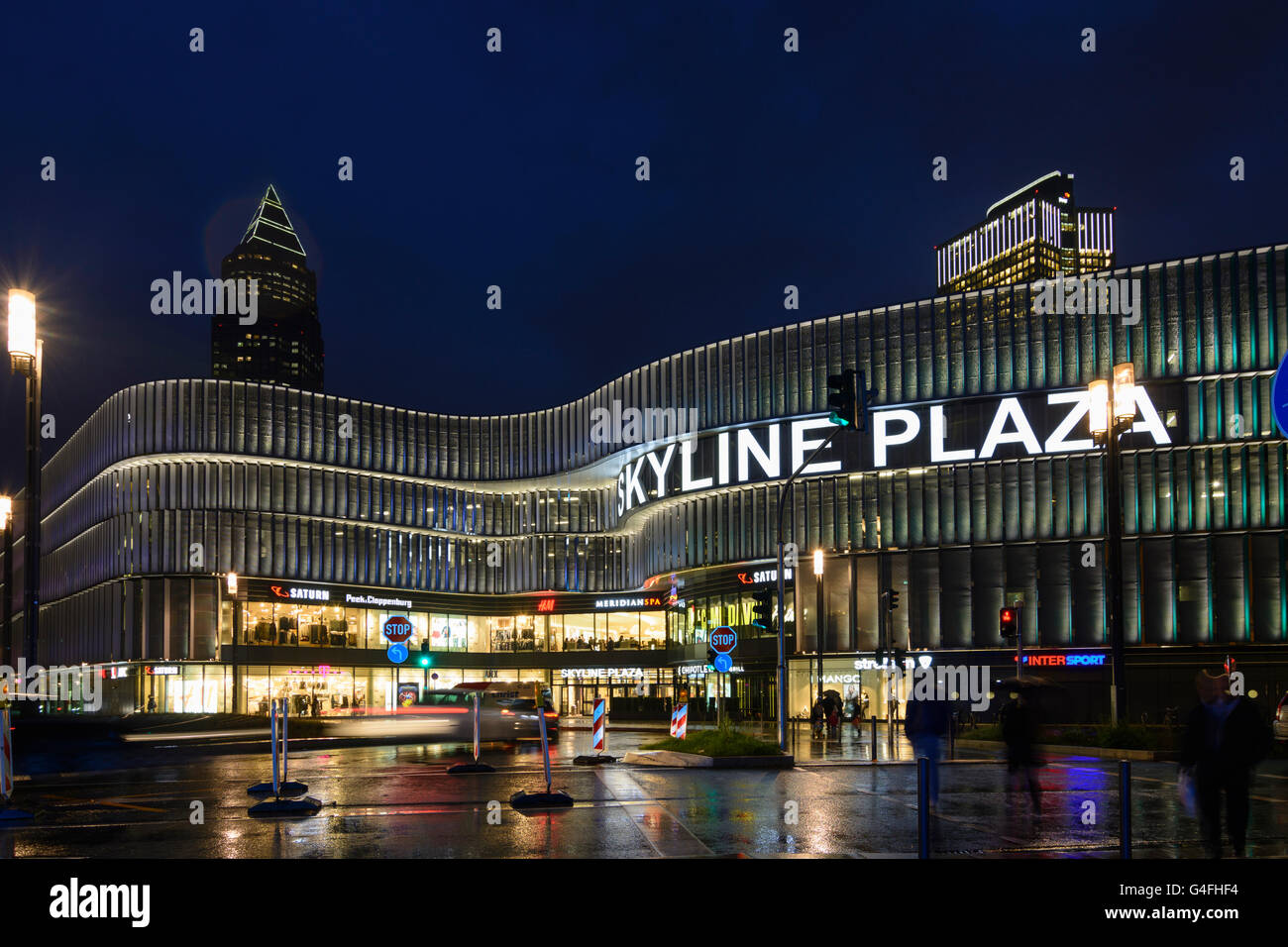 Skyline Plaza shopping center at night and rain with the Messeturm ...
