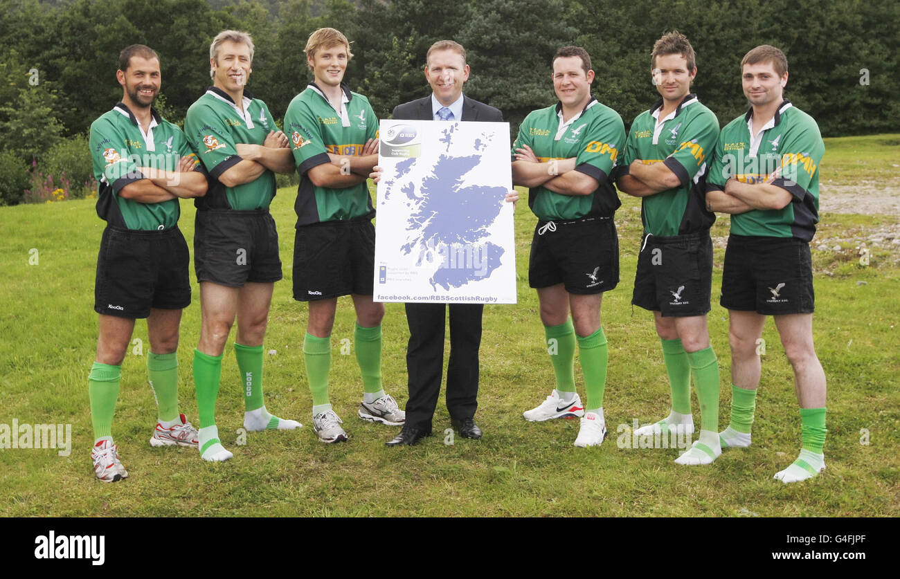 Former rugby star Andy Nichol (centre) with Strathspey rugby players ...