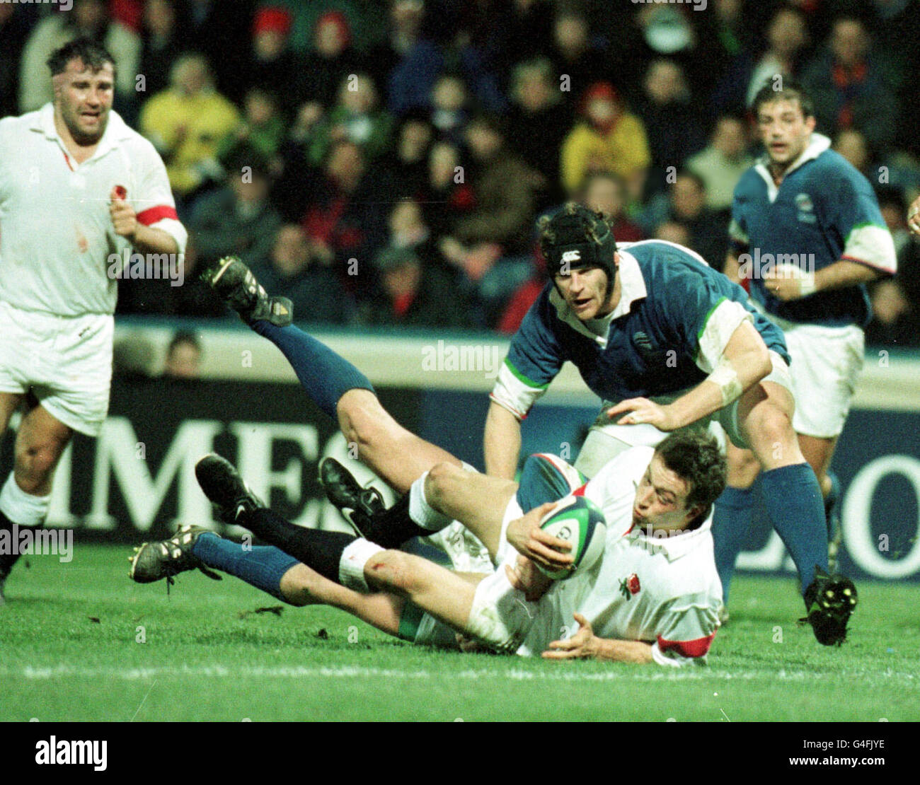 Dan Luger rolls over the line to score England's first try against ...