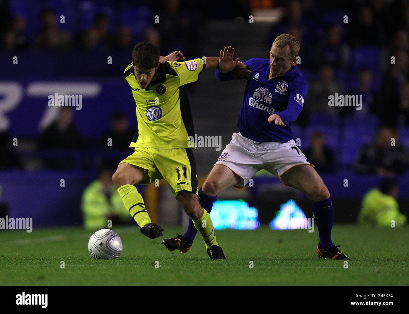 Sheffield United's Ryan Flynn (left) and Everton's Tony Hibbert (right ...