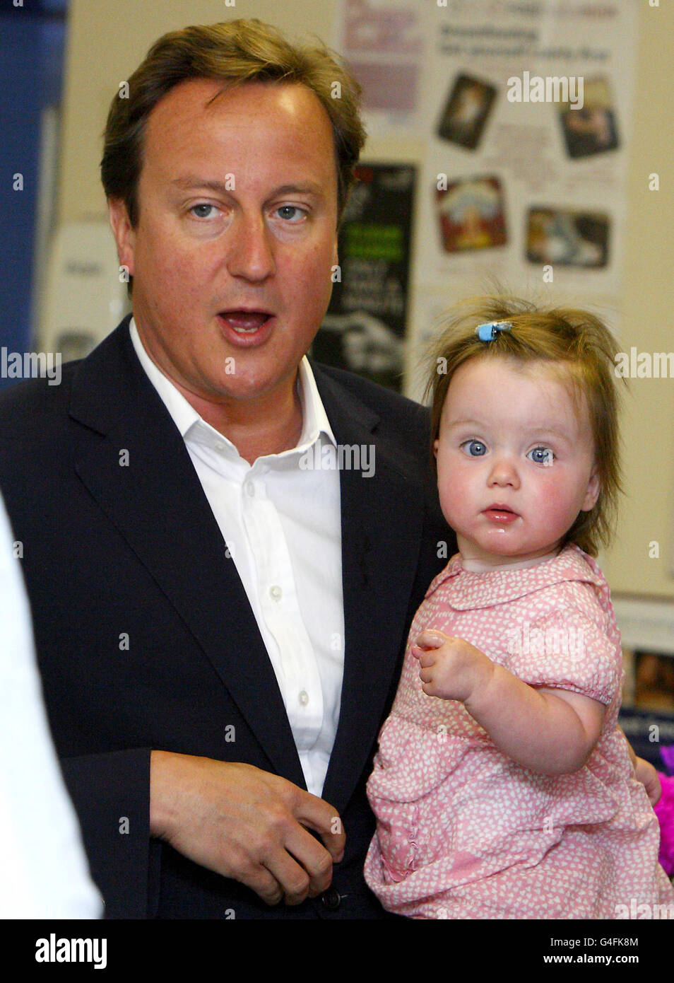 Prime Minister David Cameron and baby Florence during a visit to the ...