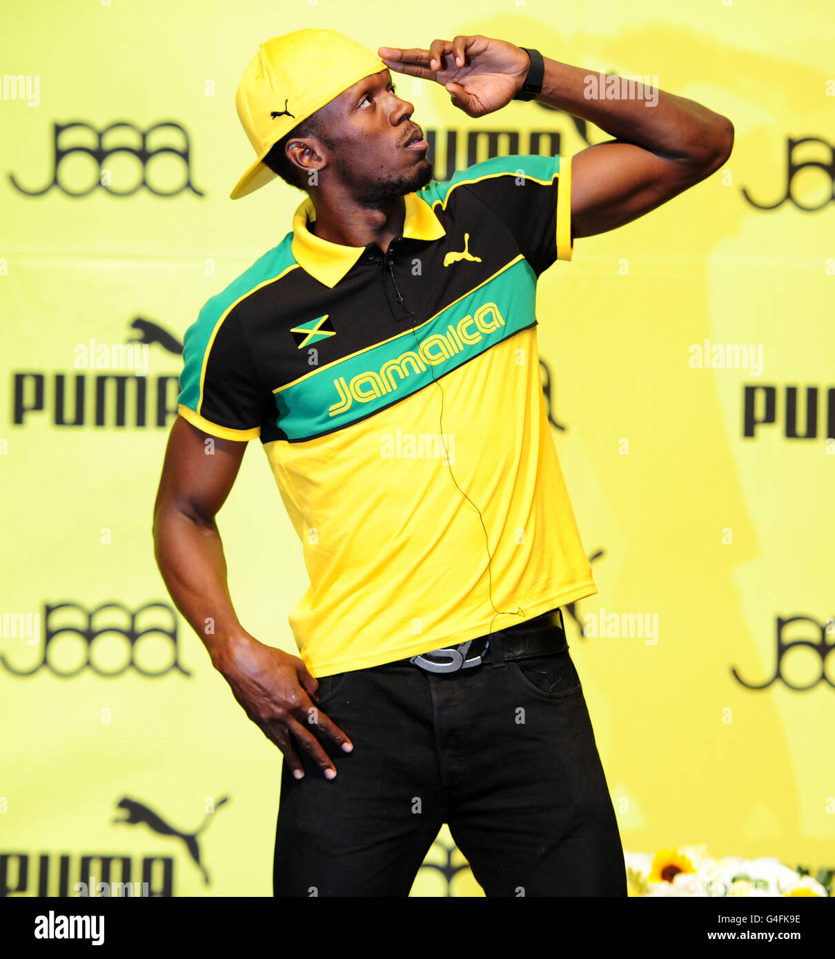 Jamaica's sprinter Usain Bolt poses for cameras after a press ...