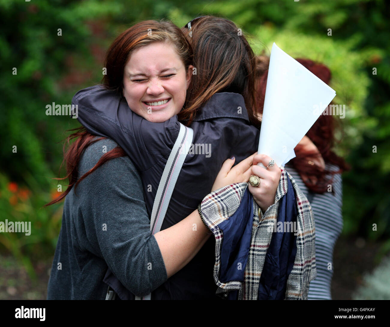 Chloe Jackson hugs her mother as she celebrates her GCSE exam results ...