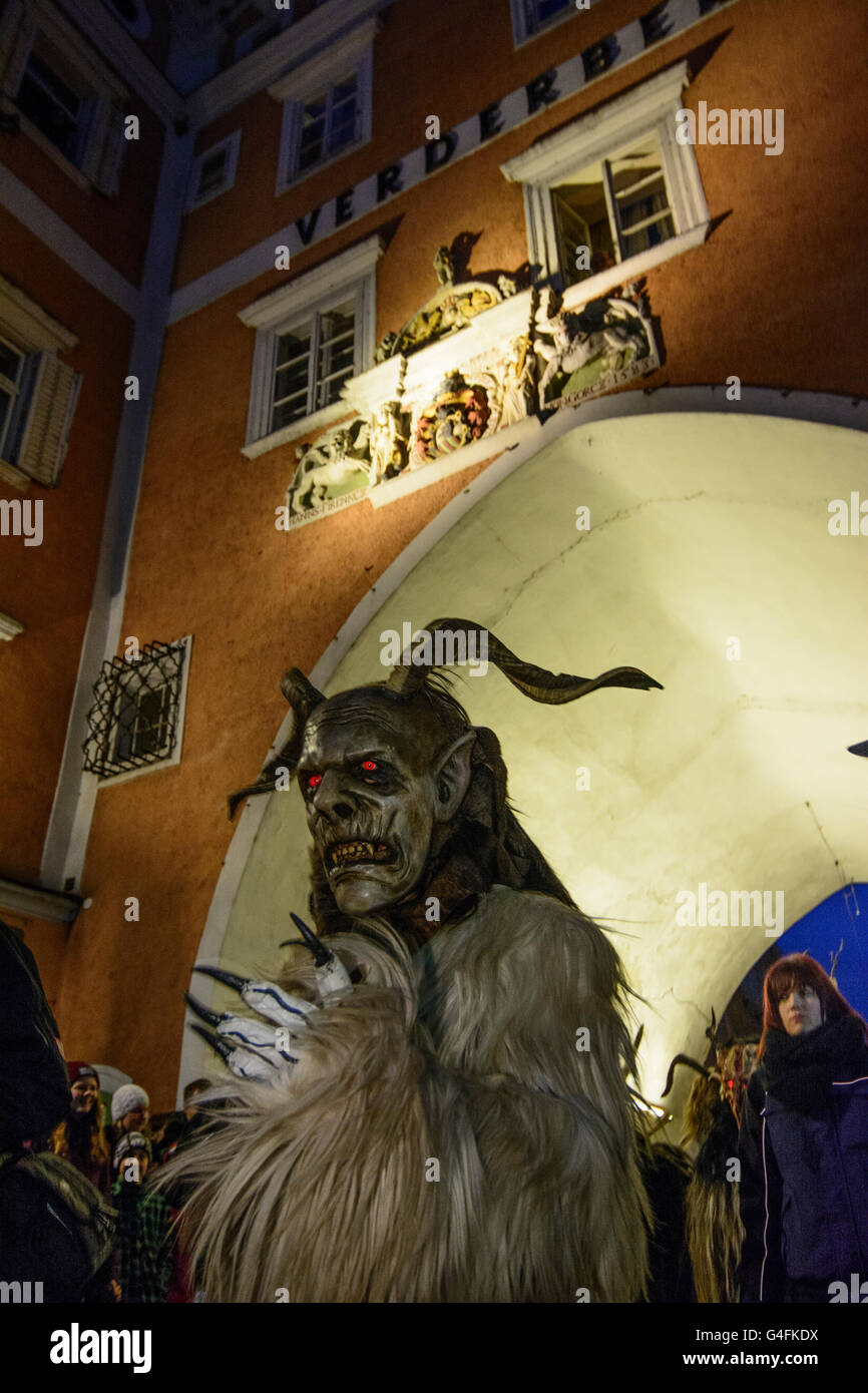 mask procession Perchtenlauf with Krampus at square Hauptplatz, house ...