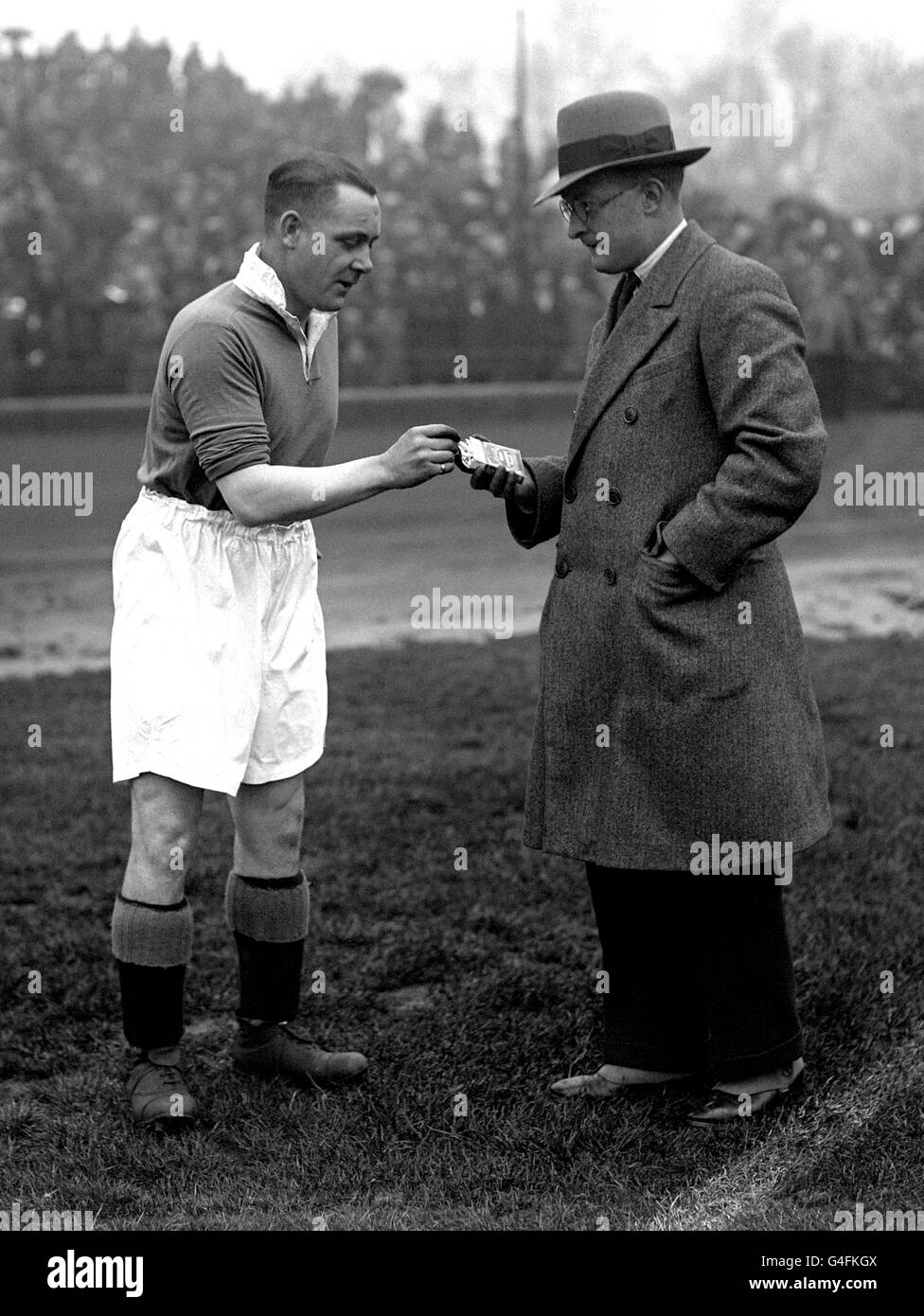Chelsea player takes a cigarette Stock Photo - Alamy