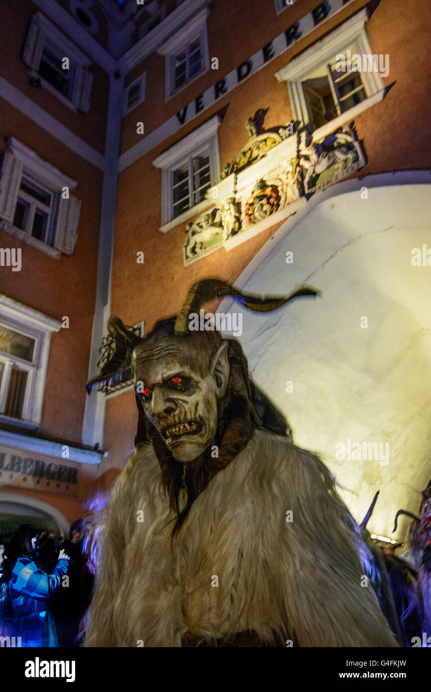 mask procession Perchtenlauf with Krampus at square Hauptplatz, house ...