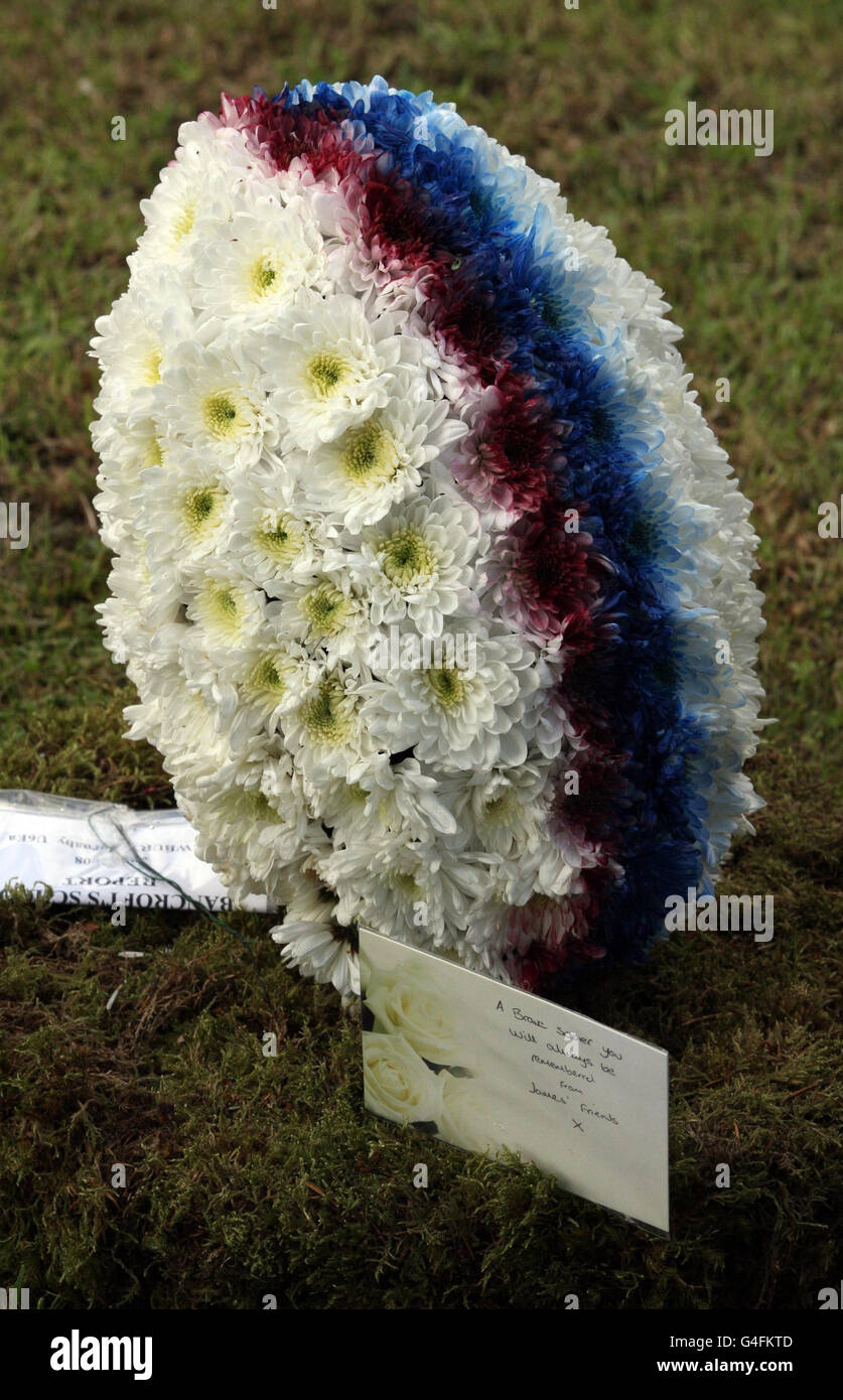A floral tribute shaped as a rugby ball in memory of Lieutenant Daniel ...