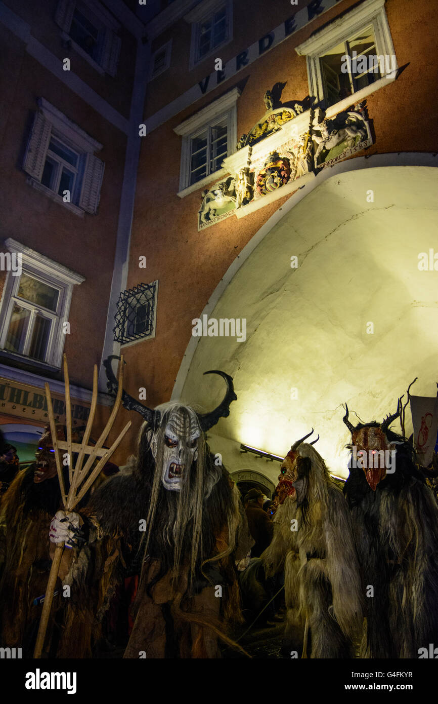mask procession Perchtenlauf with Krampus at square Hauptplatz, house ...