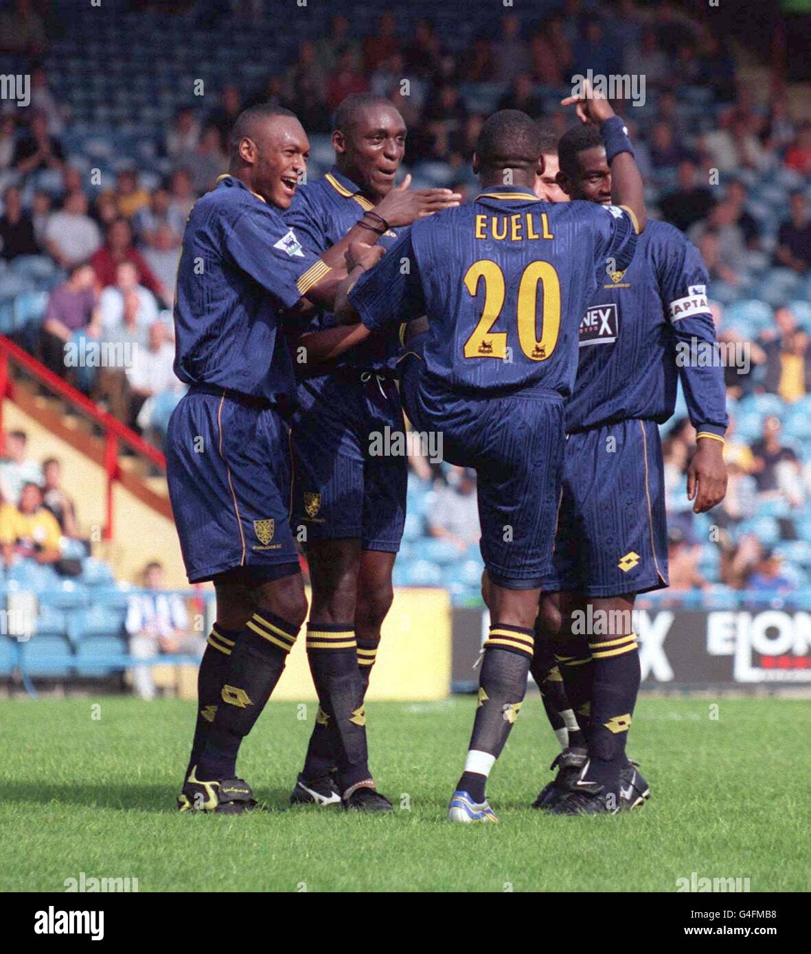 Wimbledon's Jason Euell celebrates his first goal with (l-r) Marcus ...