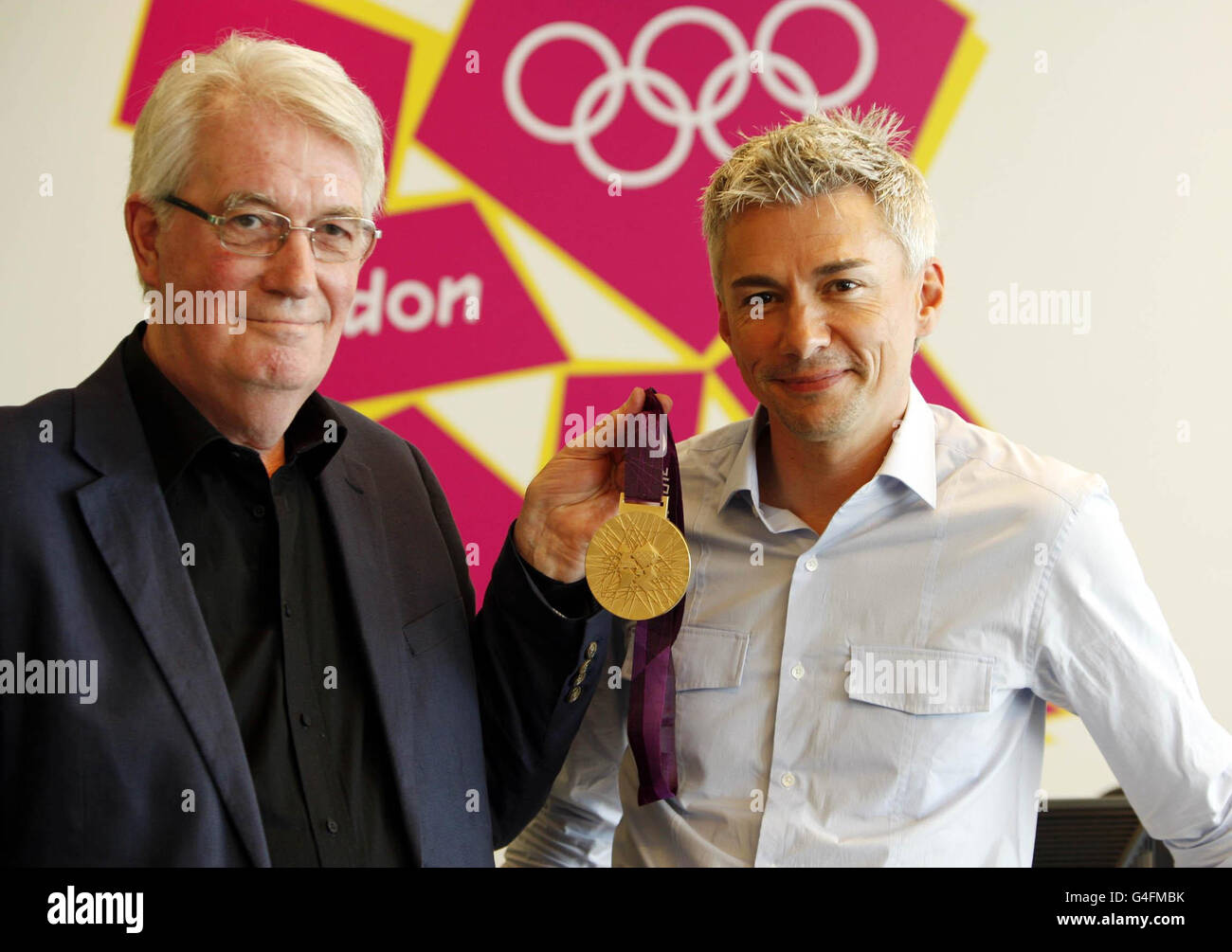 Designer of the 2012 Olympic medals David Watkins with former triple ...