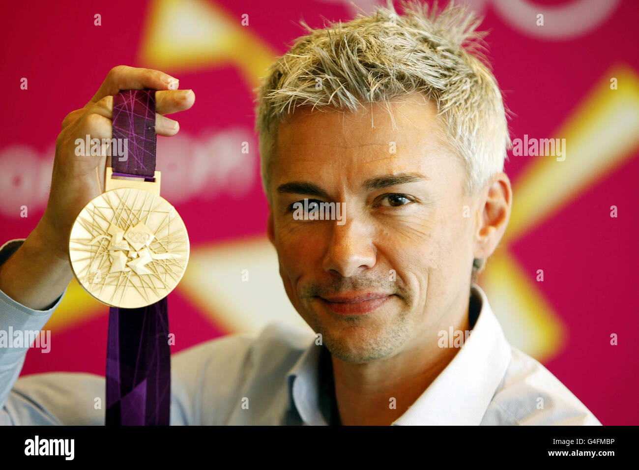 Former British Triple Jumper Jonathan Edwards with the 2012 Olympic ...