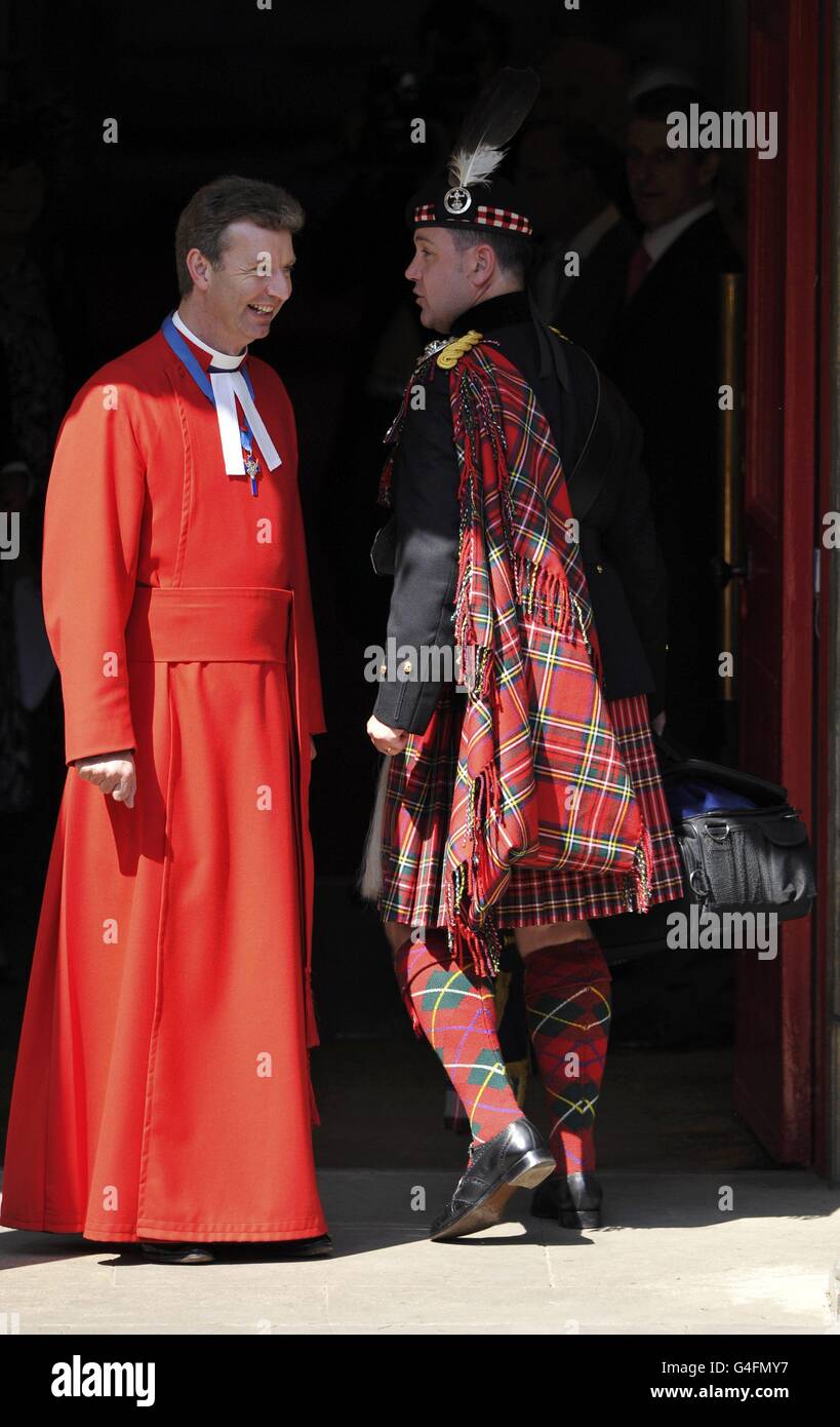 The Queen's Piper Pipe Major Derek Potter speaks to the Reverend Neil ...
