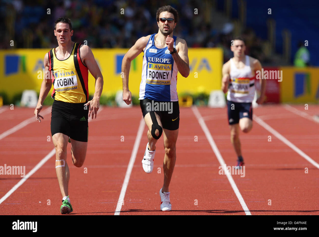Robert Tobin and Martyn Rooney (centre) during the mens 400m heats ...