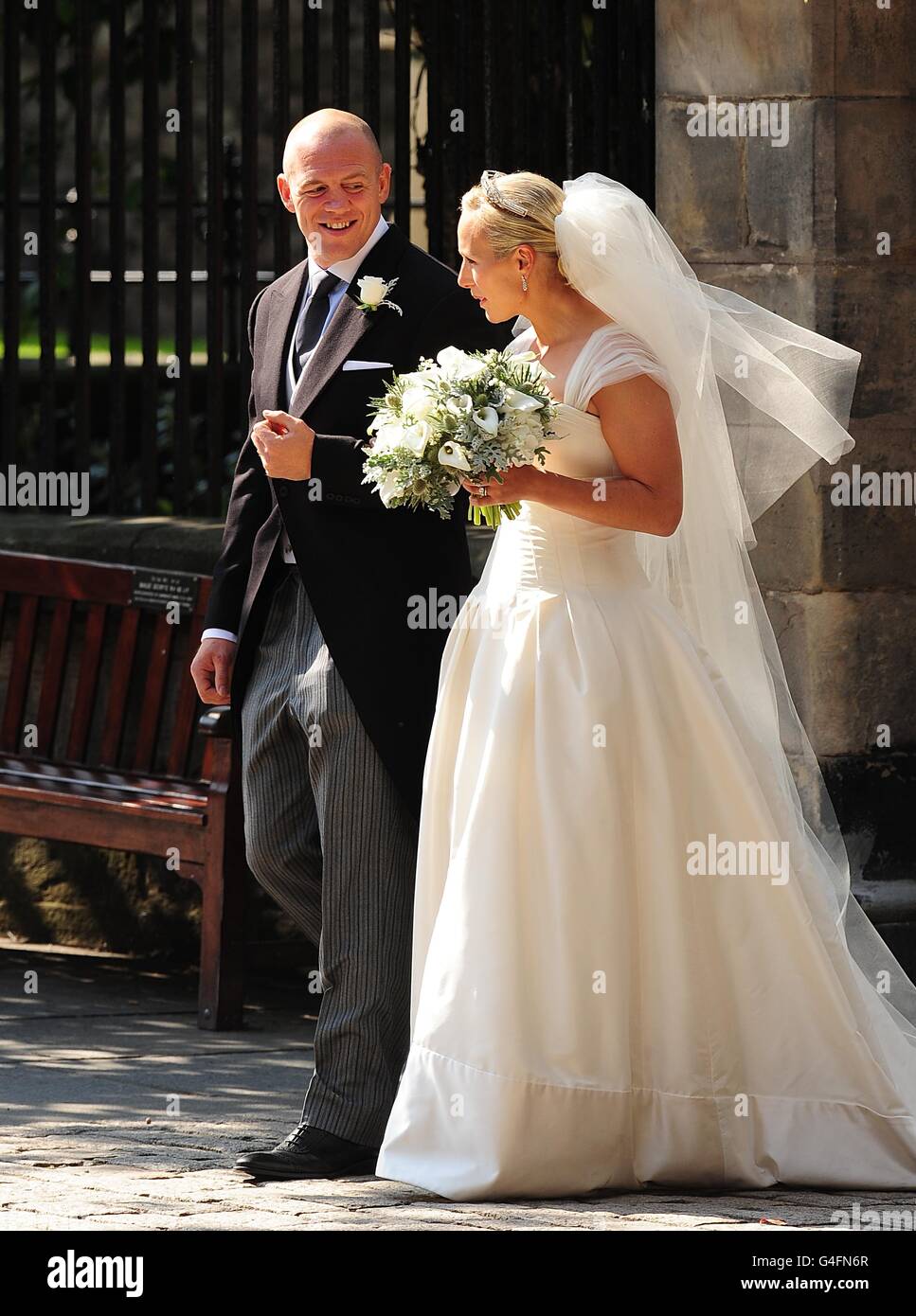Mike Tindall and Zara Phillips step out of Canongate Kirk on Edinburgh ...