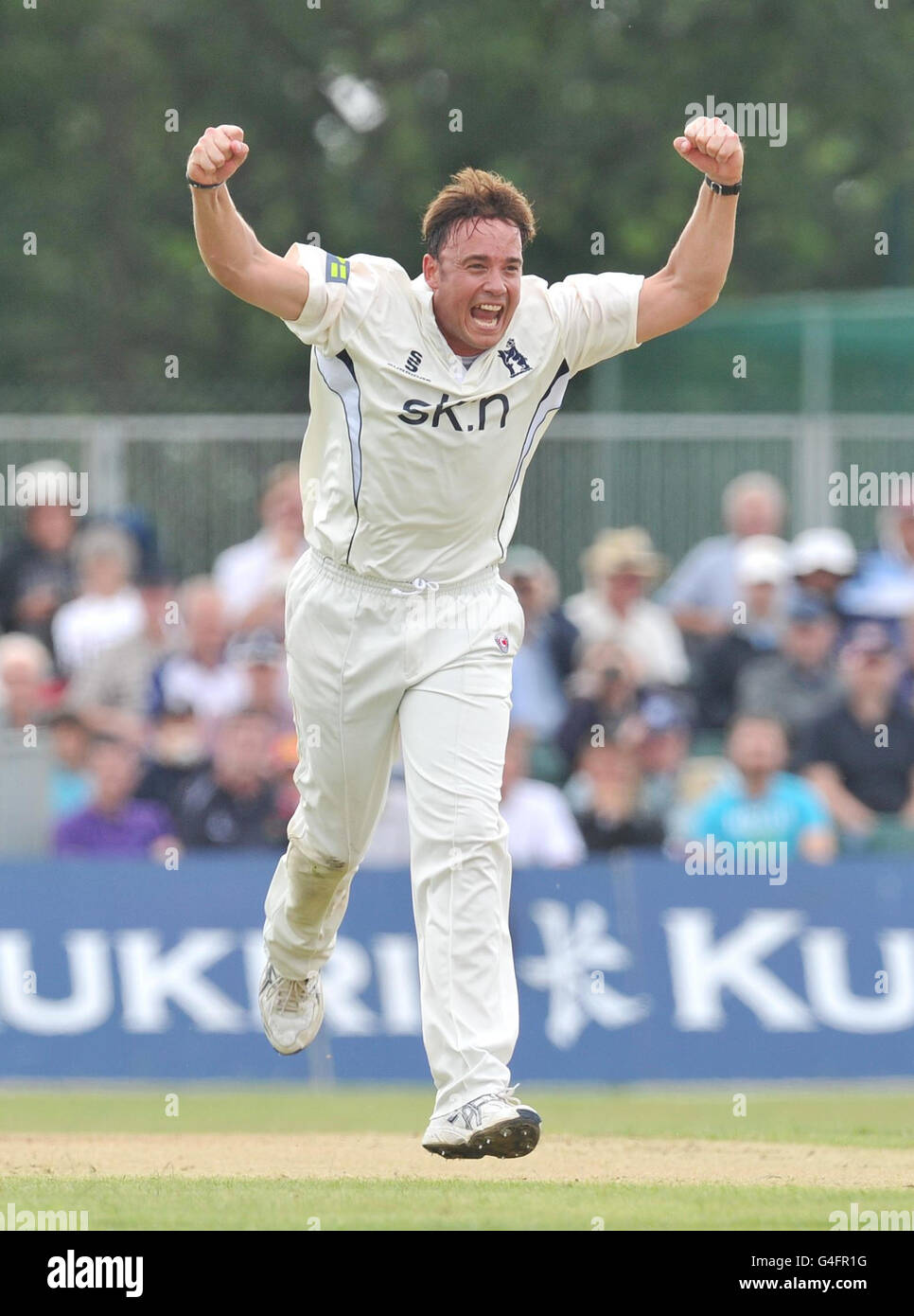 Warwickshires Neil Carter celebrates taking the wicket of Lancashires ...