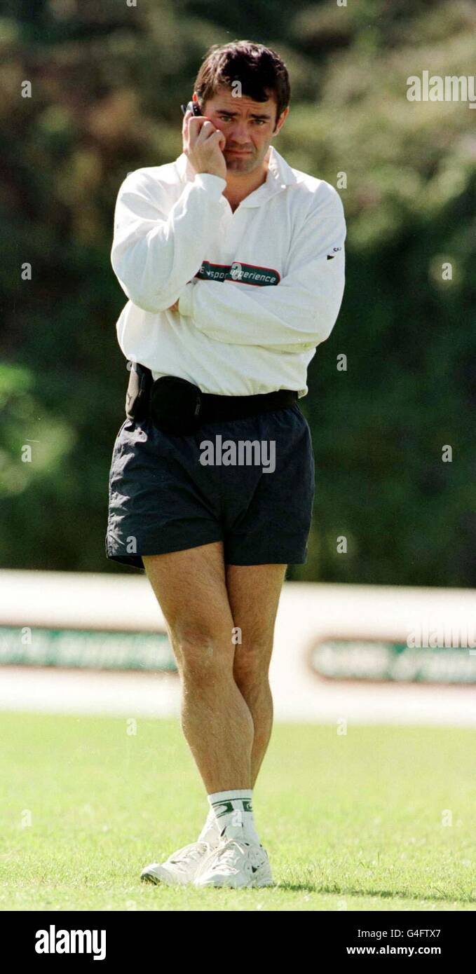 Former England rugby captain Will Carling on the phone after a ...