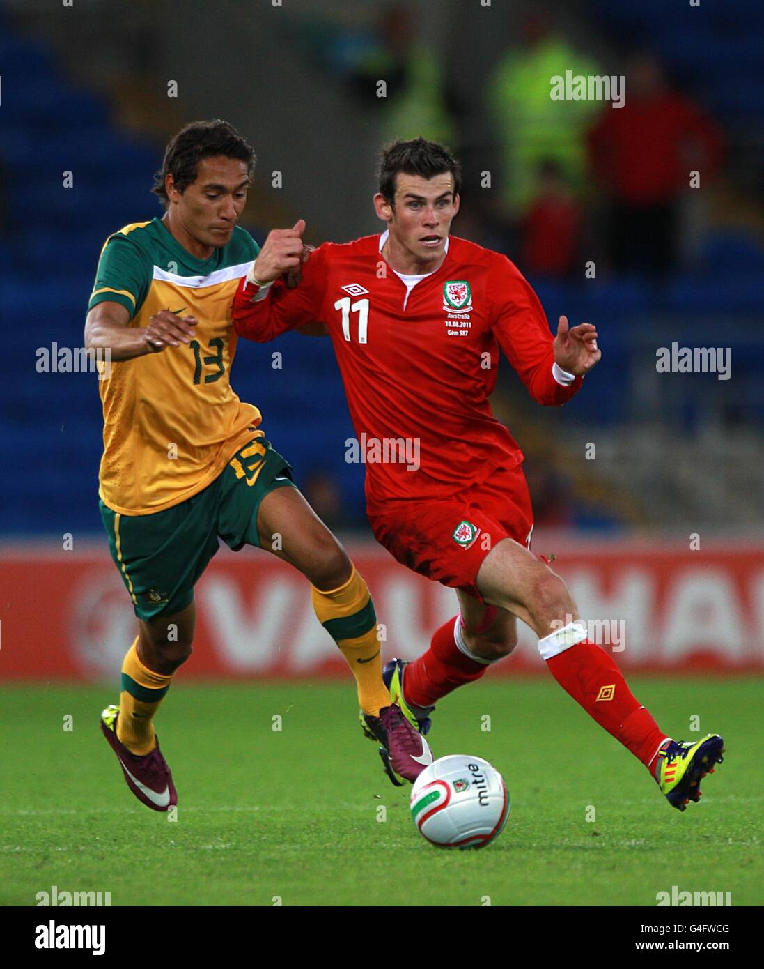 Wales' Gareth Bale (right) and Australia's Adam Sarota (left) battle ...