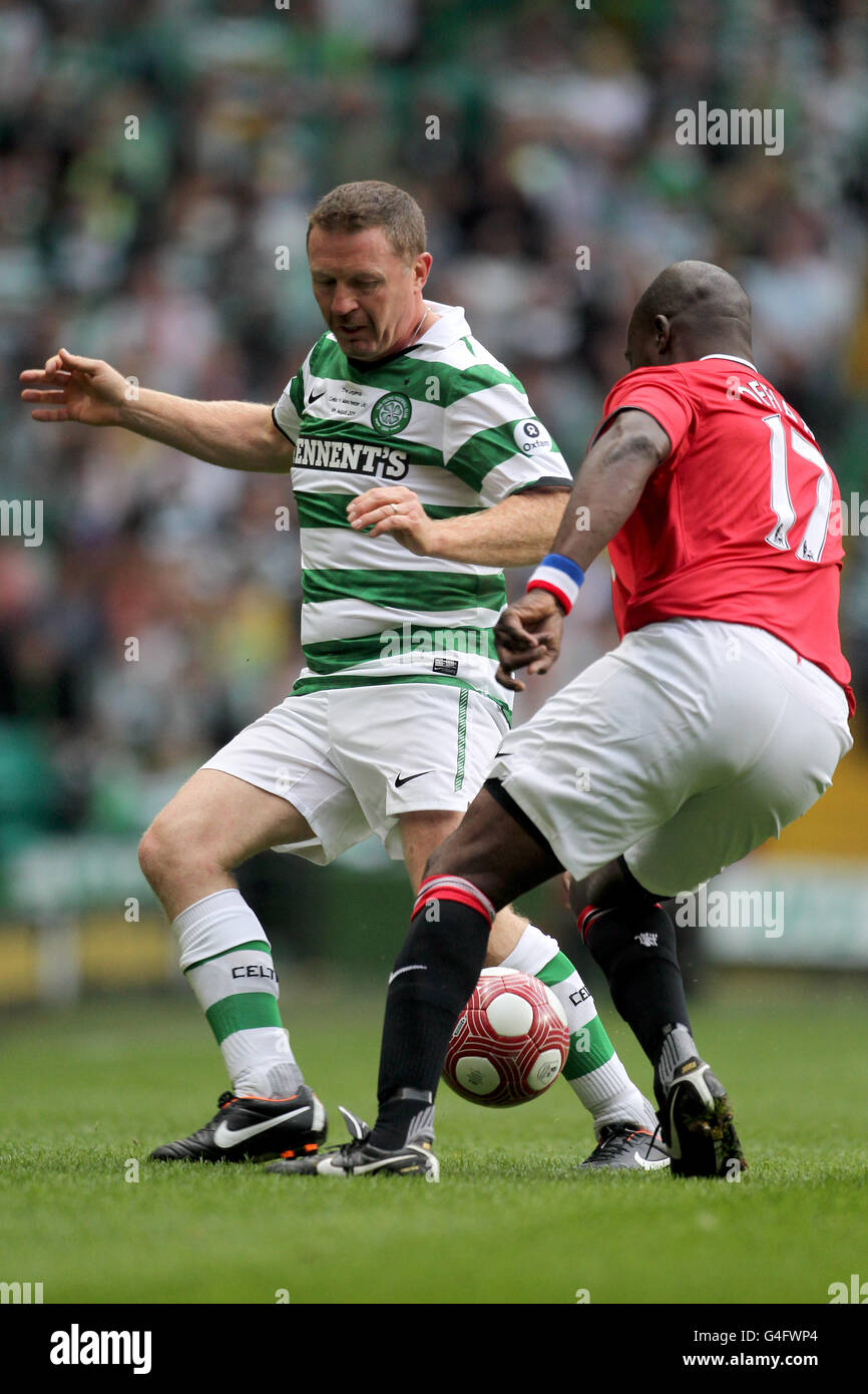 Former boxer Steve Collins (left) in action against Manchester United's ...