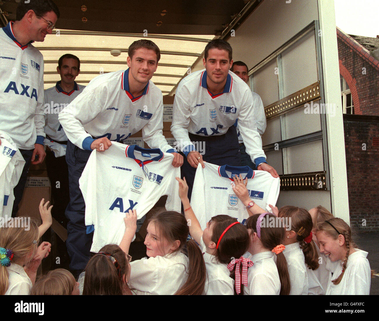 AXA FOOTBALL KITS FOR THE COMMUNITY Stock Photo - Alamy