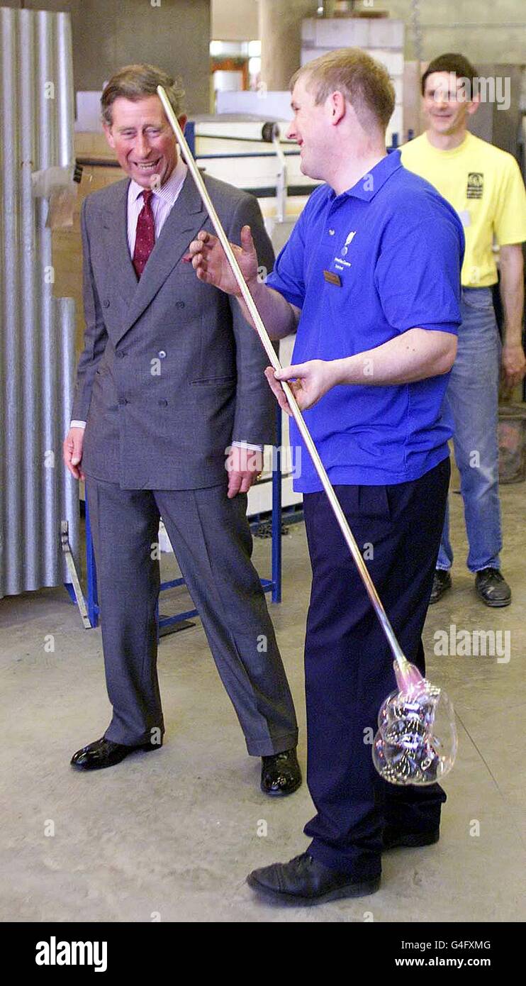 The Prince of Wales laughs with studio manager Barry Clark after he ...