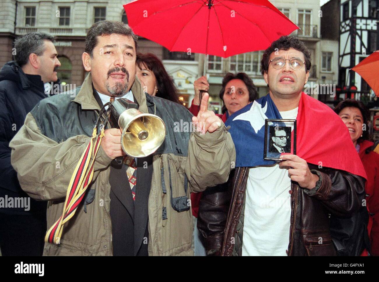 Chilean human rights activists Vincente Alegria (left) joins protesters ...