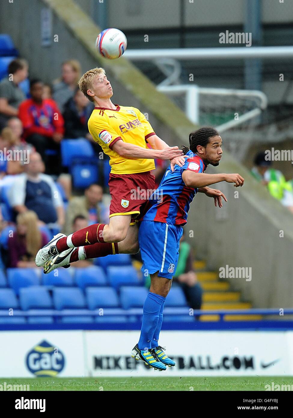 Crystal Palace's Sean Scannell (right) and Burnley's Ben Mee battle for ...