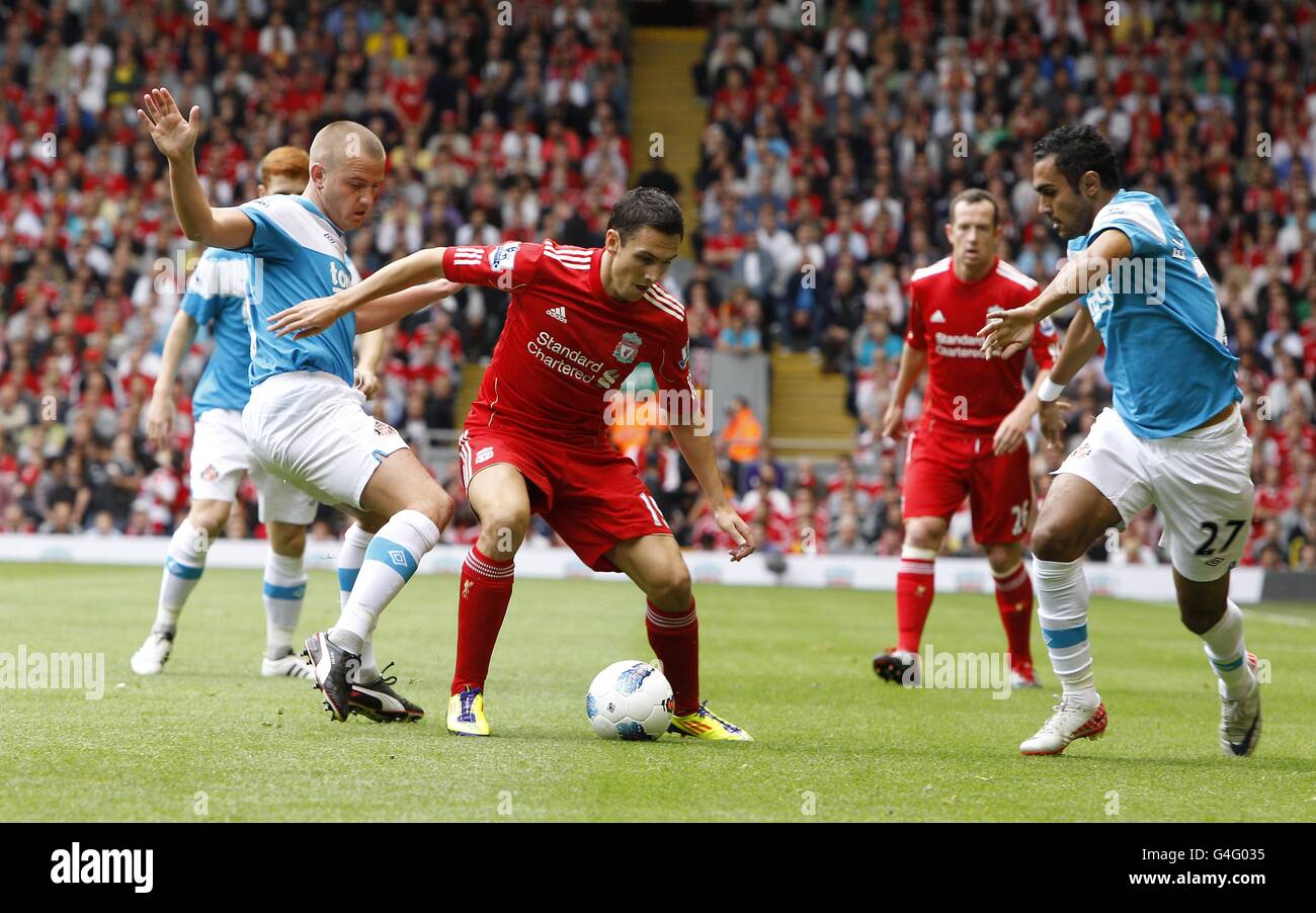 Liverpool's Stewart Downing and Sunderland's Lee Cattermole (left ...