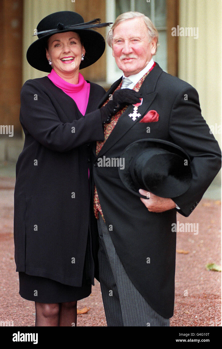 Actor Leslie Phillips, 74, with his wife Angela Scoular outside ...